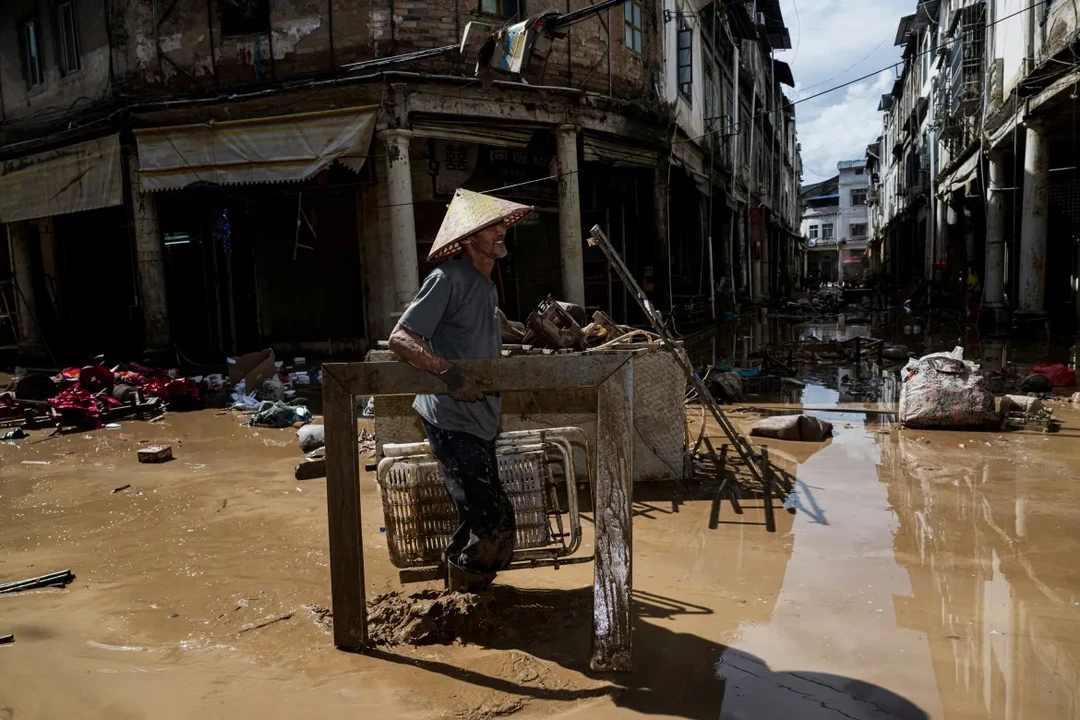 Historic floods in China kill 47, authorities warn of extreme weather ...