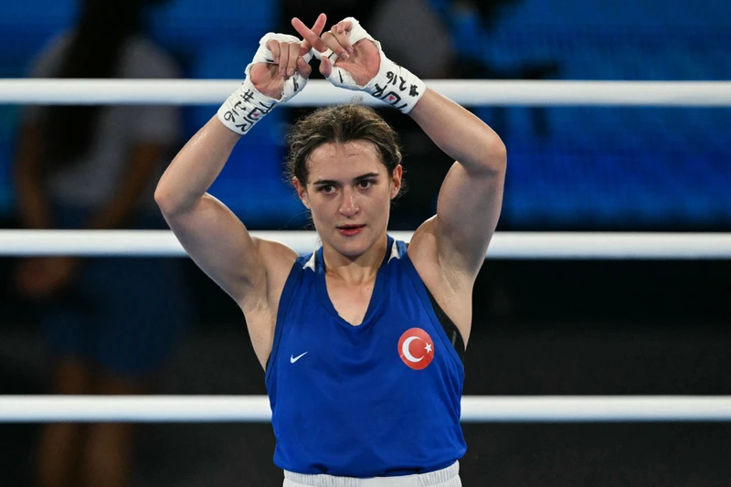 Turkish boxer protests gender controversy with X sign after losing to ...